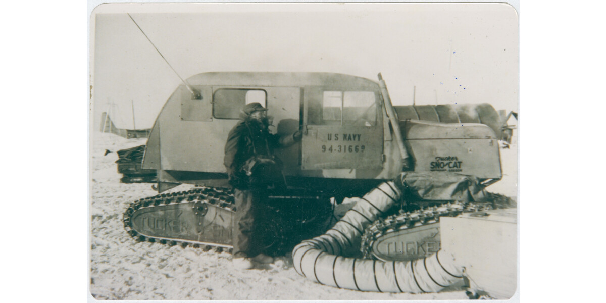 A man with a US Navy Snowcat | discoverywall.nz