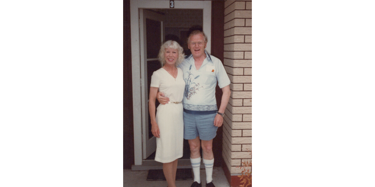 Portrait of Judy Cooper and Sandy Allchurch, outside a house