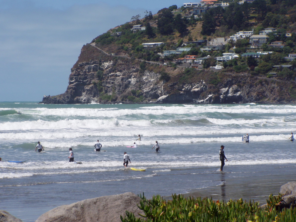 Surfers at Sumner Beach | discoverywall.nz