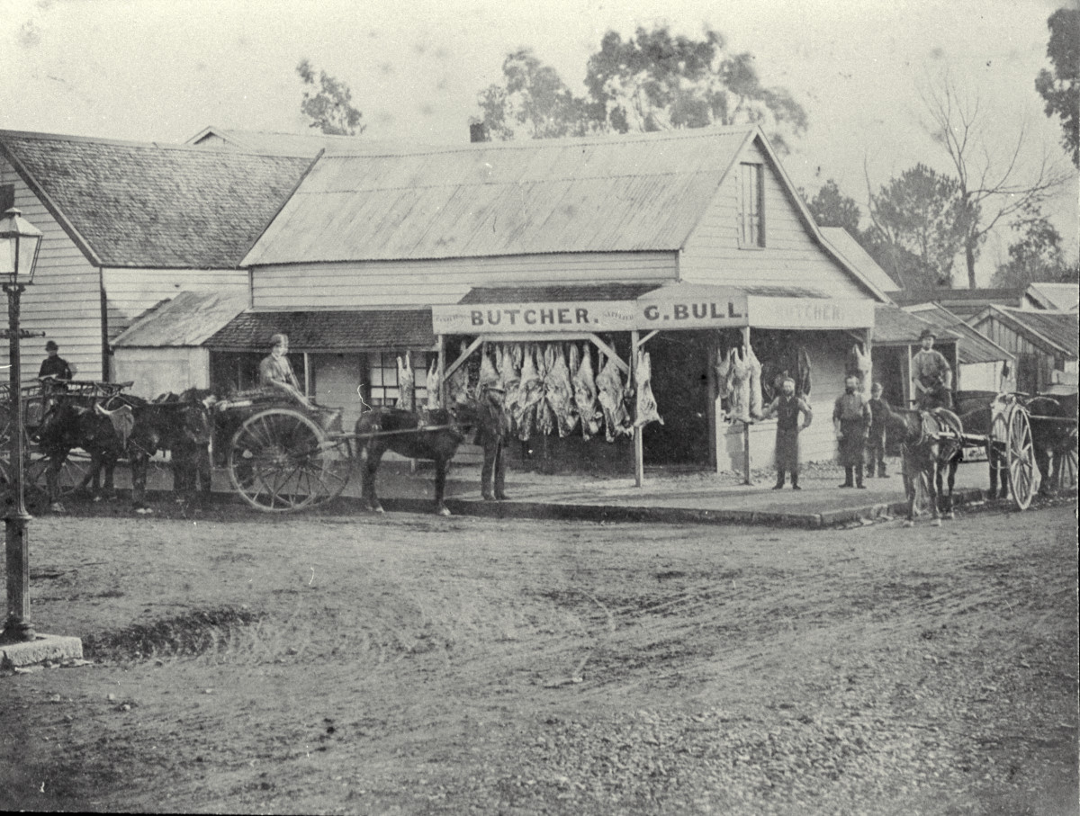 Meat hangs outside G. Bull's butchery in Cashel Street,...