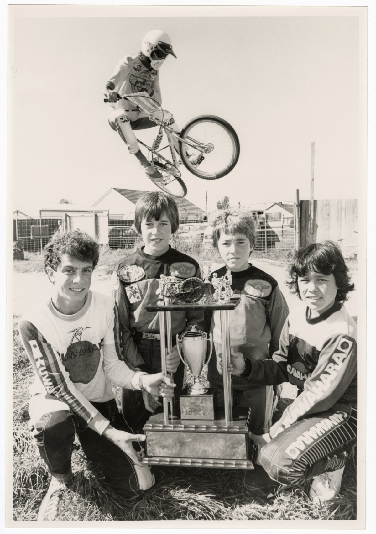 Bishopdale BMX racers with a trophy | discoverywall.nz
