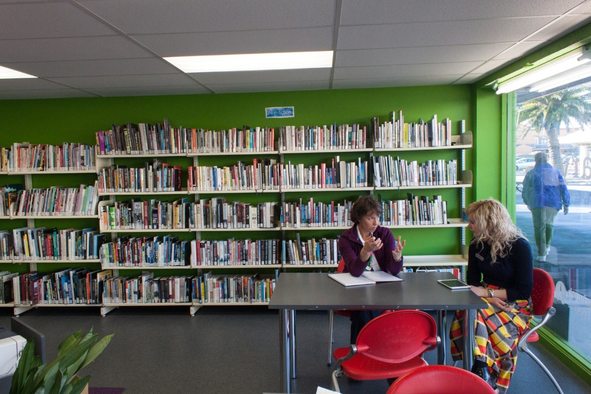 Staff in the temporary new library, New Brighton Mall