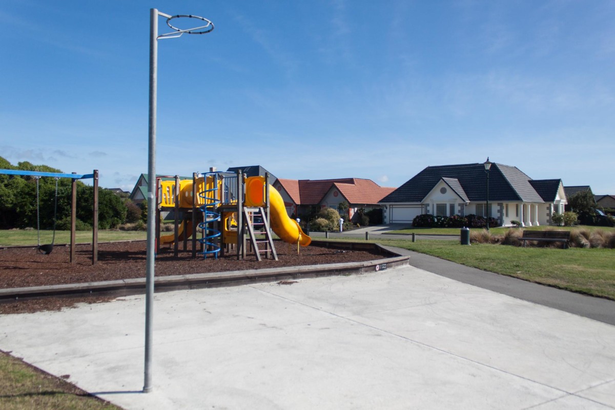 Playground and netball hoop at Aston Reserve | discoverywall.nz