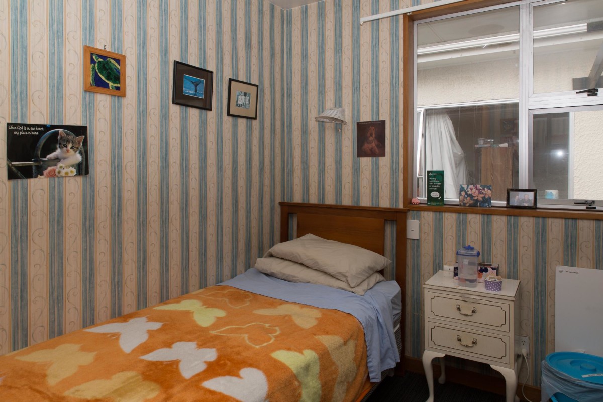 Bedroom at a rest home in New Brighton | discoverywall.nz
