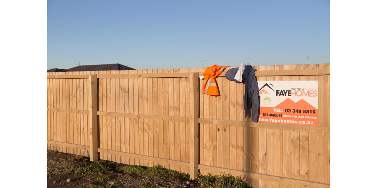 Fence with sign for FayeHomes, Wigram Skies | discoverywall.nz