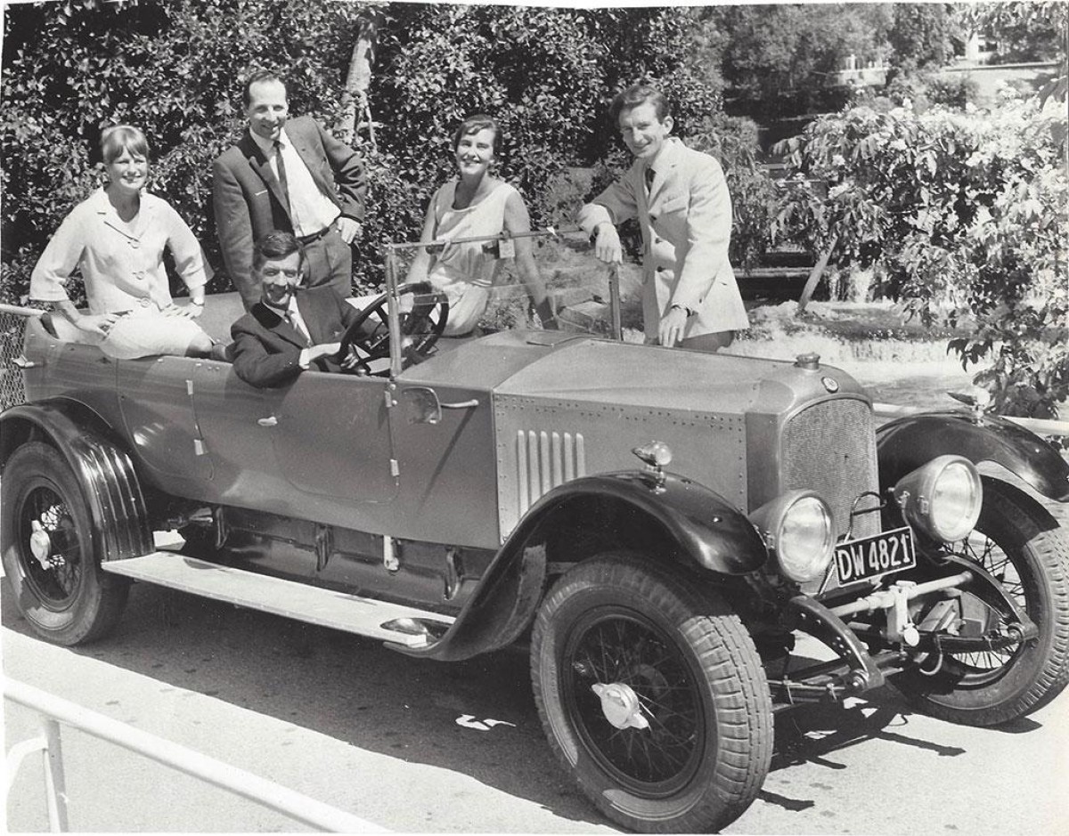 Group portrait with a Vauxhall | discoverywall.nz