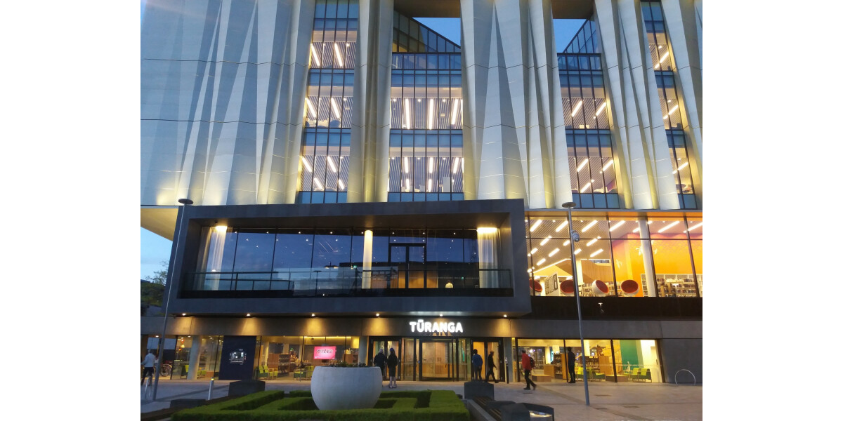 Entrance to Tūranga at dusk | discoverywall.nz
