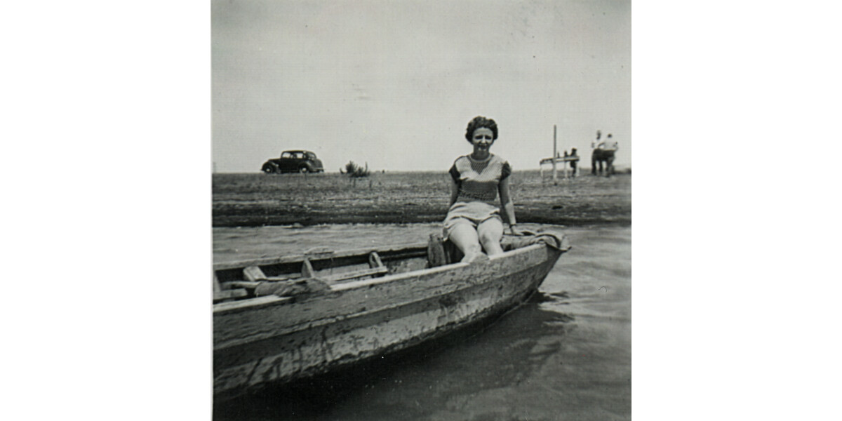 Lady in a boat | discoverywall.nz